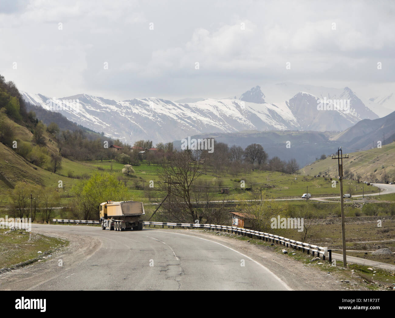 The Georgian Military Highway in springtime, along the Aragvi river in ...