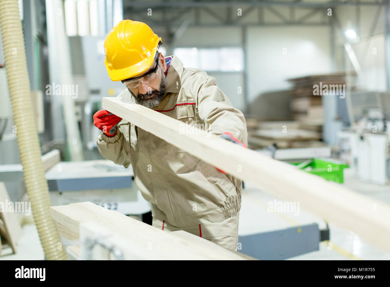 Man working in factory hi-res stock photography and images - Alamy