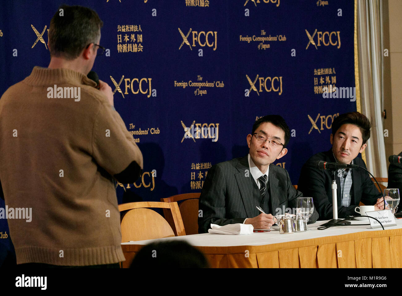 Lawyer Ken Kawai (C) and Hikaru Kusaka (R) Co-founder of BLOCKHIVE ...