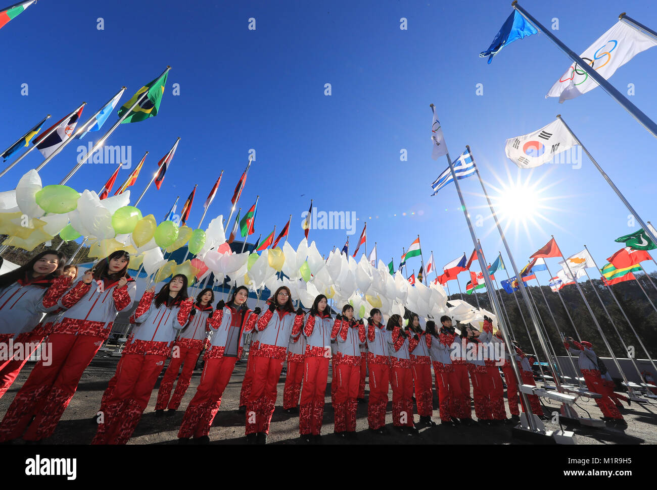 01st Feb, 2018. Olympic athletes' village opens The flags of nations ...