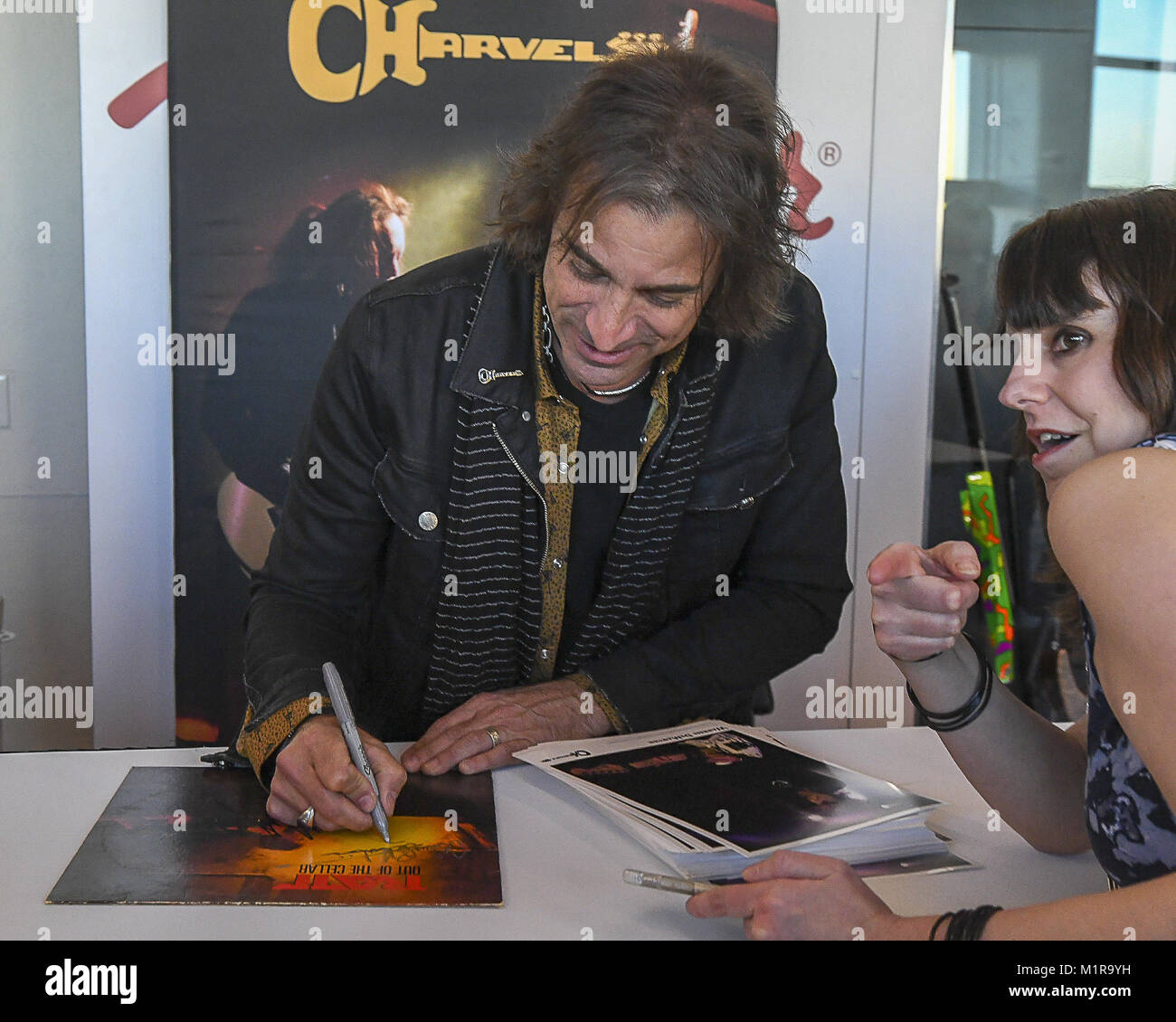Anaheim, CA, USA. 25th Jan, 2018. Warren DeMartini signs at the Charvel ...