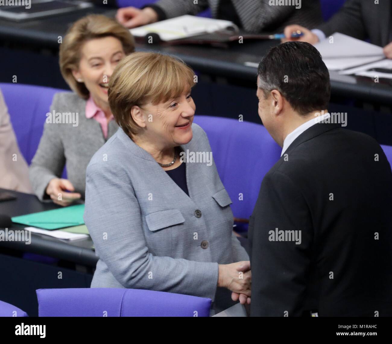 Berlin, Germany. 1st Feb, 2018. German chancellor Angela Merkel (C ...