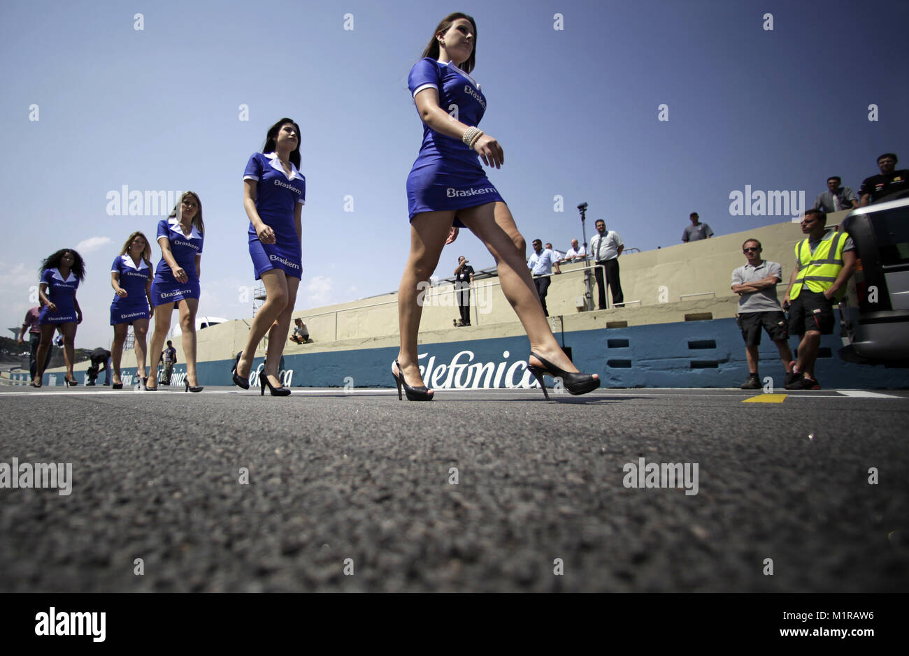 Sao Paulo, Brazil. 03rd Nov, 2010. Grid girls walk along the race track ...