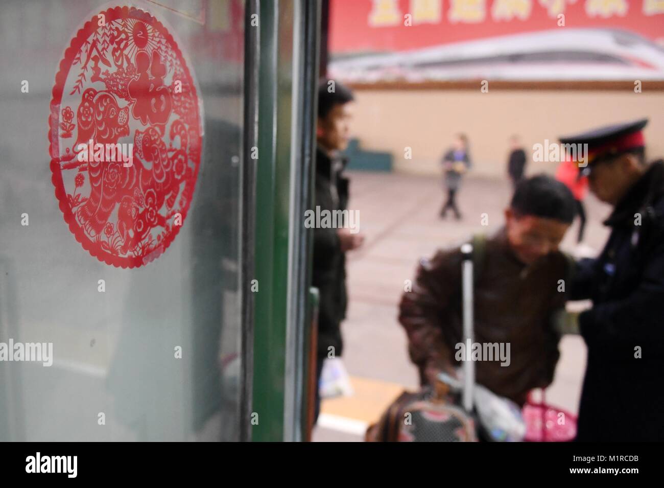 Beijing, China. 1st Feb, 2018. A papercut reading "Fu", a Chinese ...