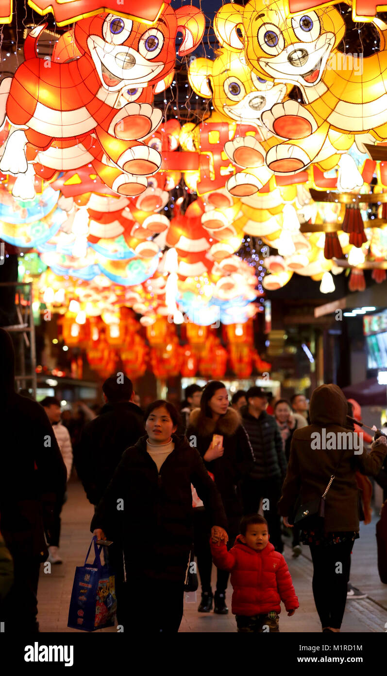 Shanghai. 1st Feb, 2018. People visit lanterns during a lantern fair at ...