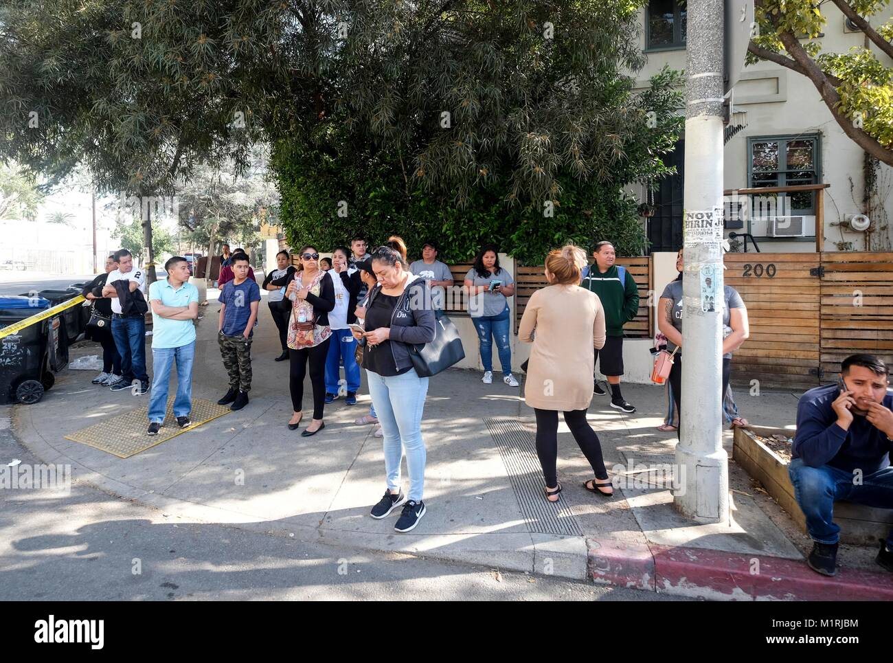 Los Angeles, USA. 1st Feb, 2018. Parents wait to pick up their children ...