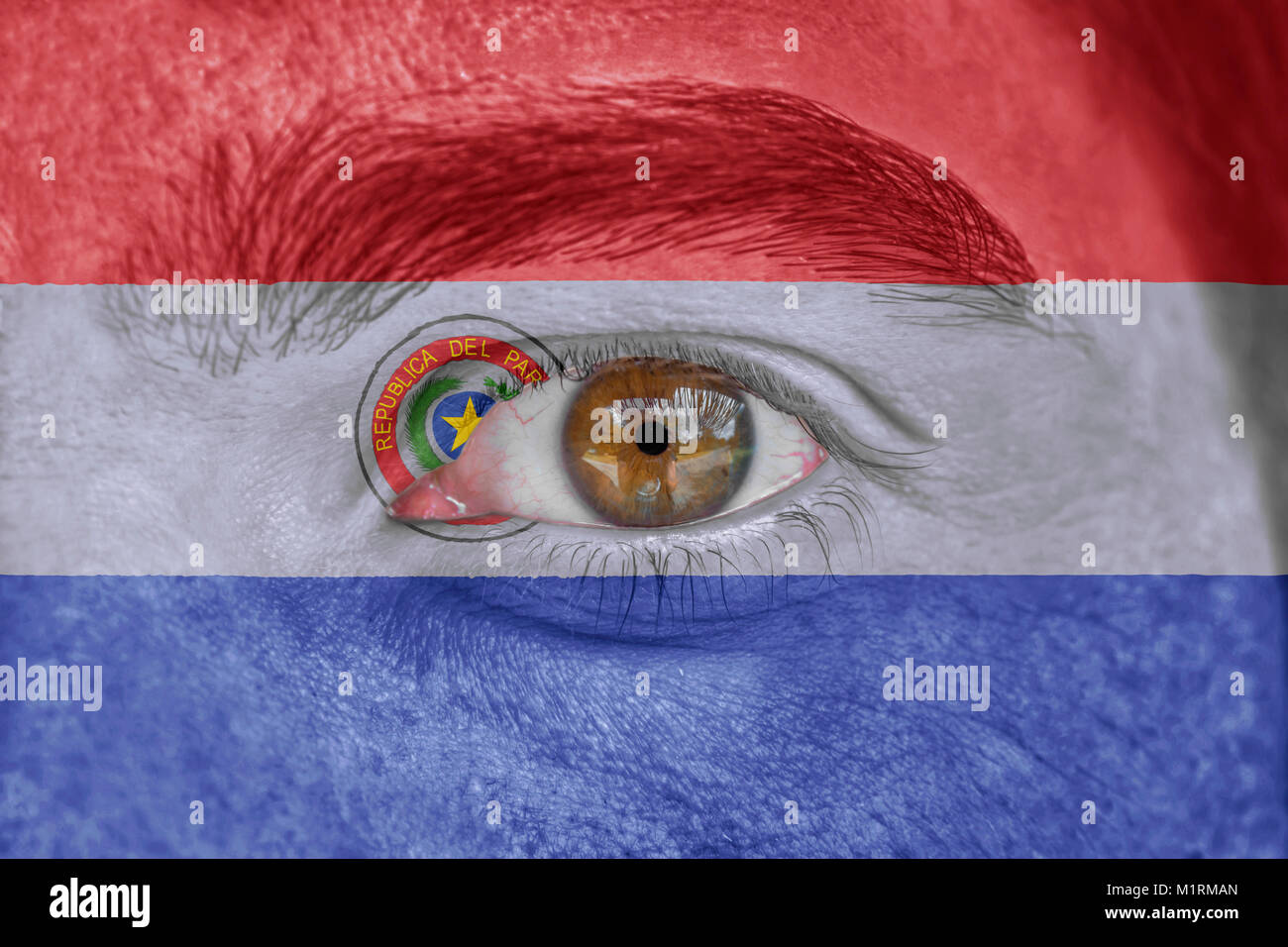 Human face and eye painted with flag of Paraguay Stock Photo - Alamy