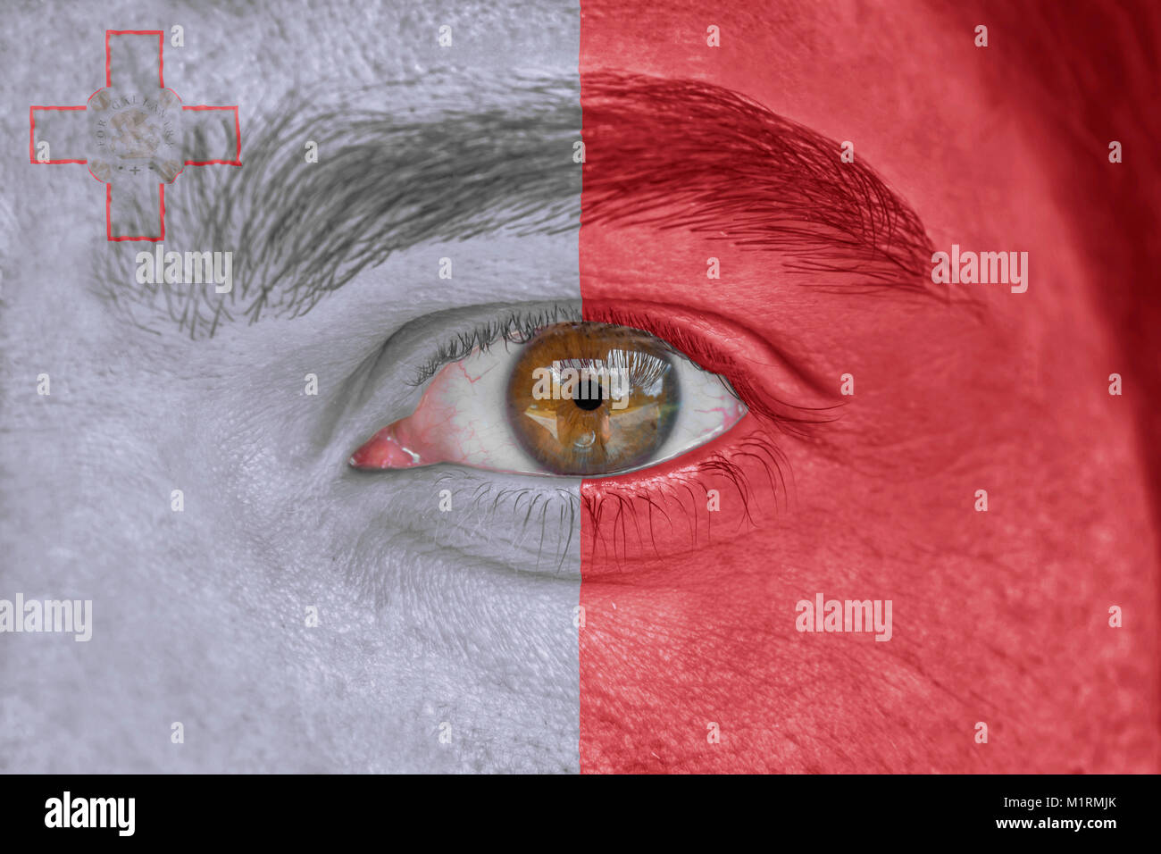 Human face and eye painted with flag of Malta Stock Photo - Alamy