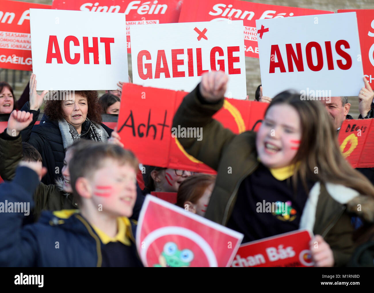 Irish language act campaigners, including pupils from Irish-medium ...