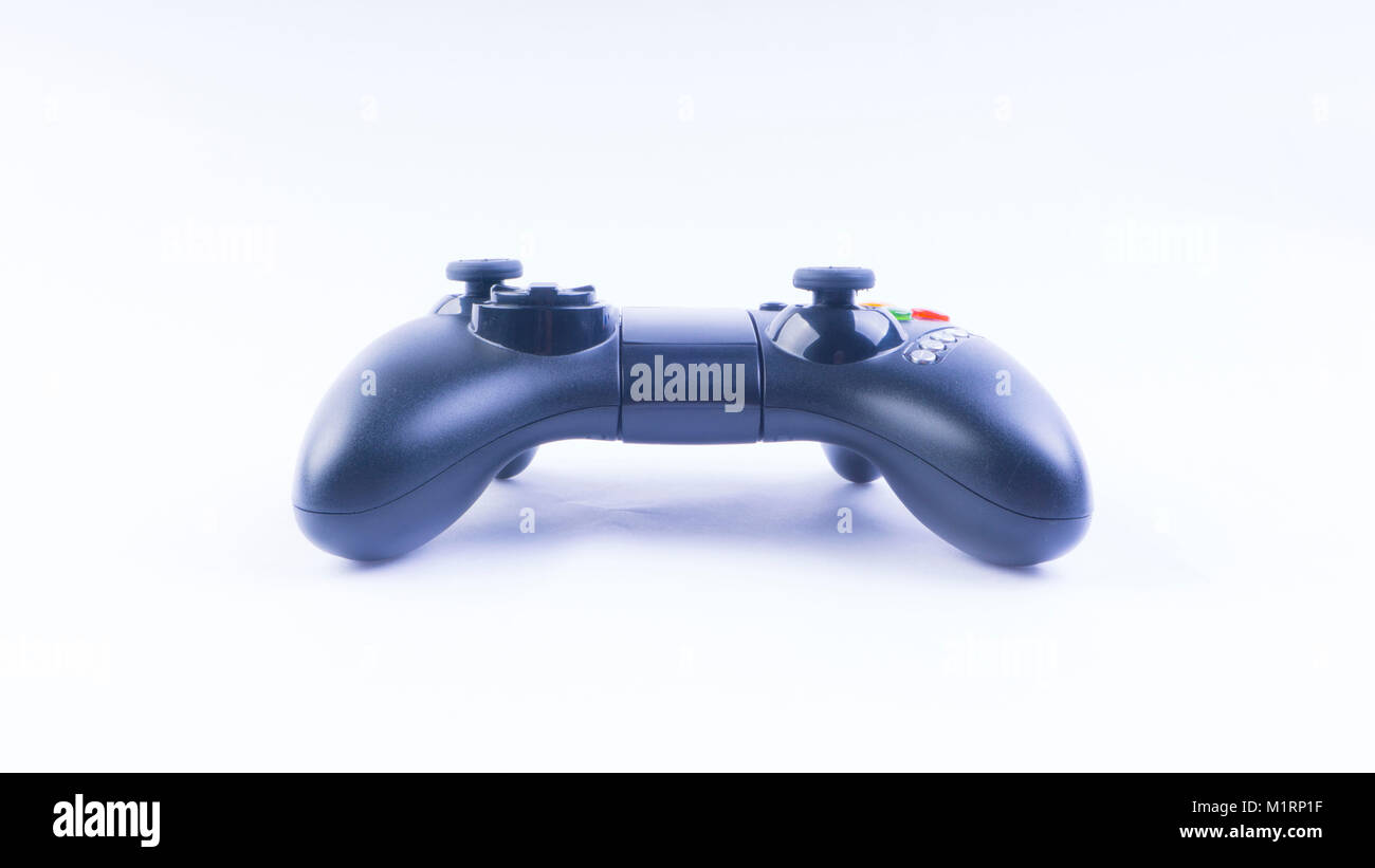 Closeup of black game controller or controller isolated on white ...