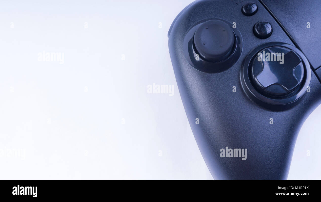 Closeup of black game controller or controller isolated on white ...