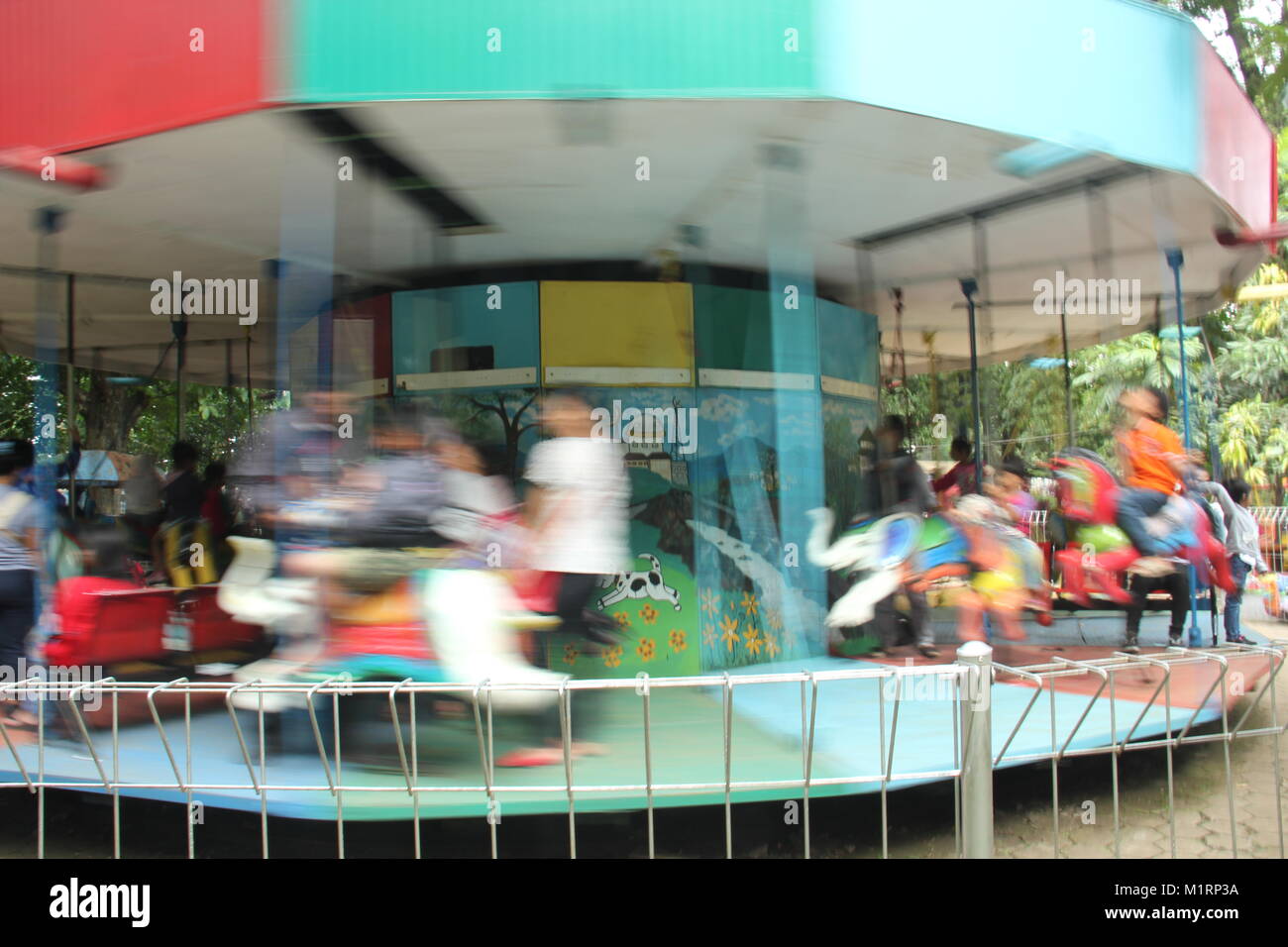 Ride a carousel in Stock Photo - Alamy