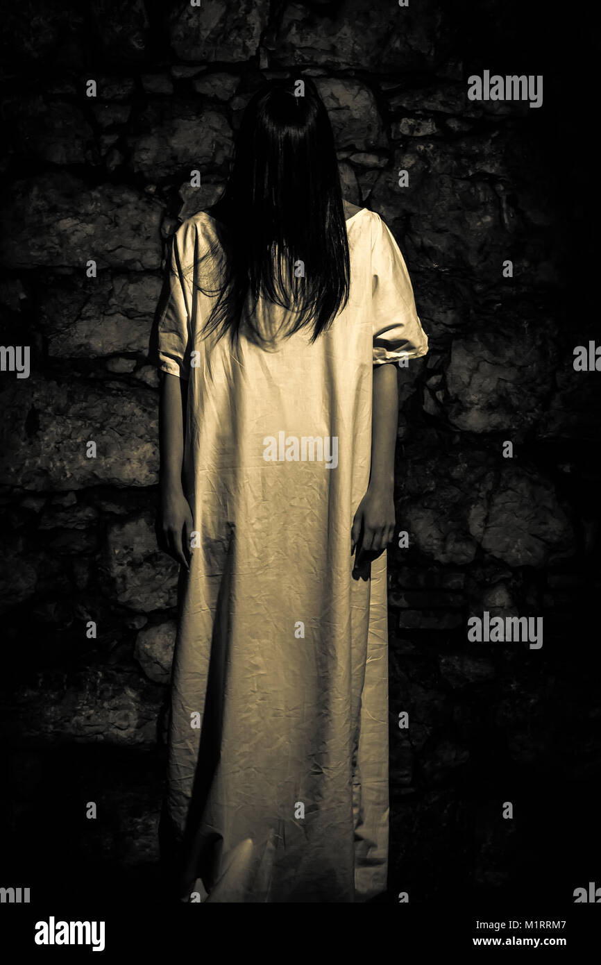 Horror Scene of a Scary Woman Stock Photo - Alamy