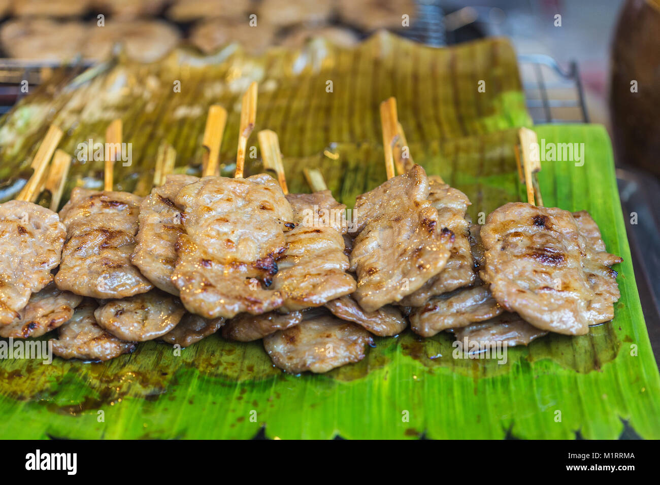 Moo-Ping. Thai Style BBQ Grilled Pork Stock Photo - Alamy