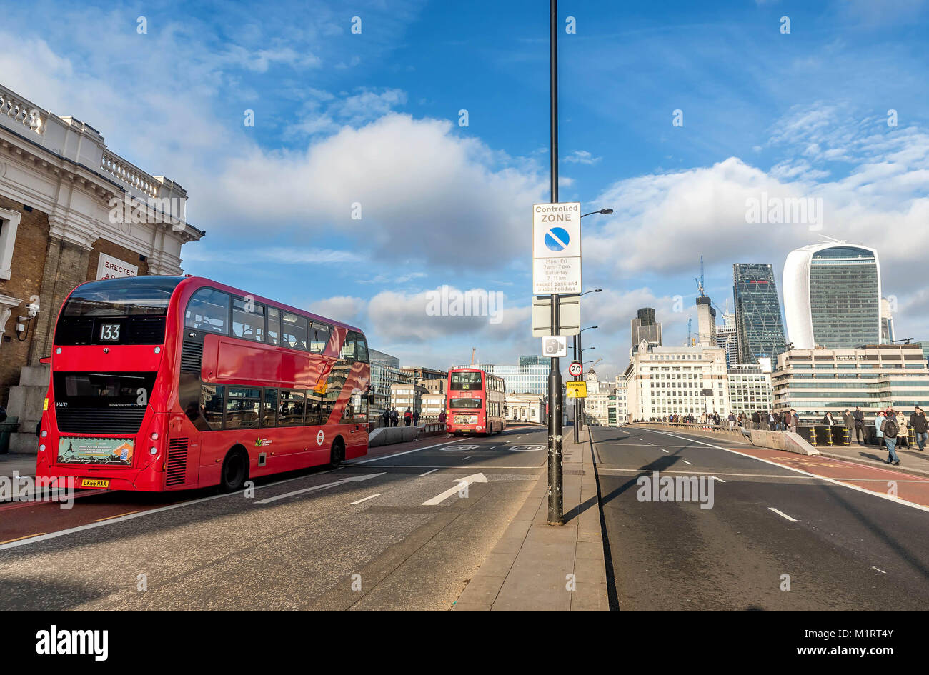 A modern double decker bus on the street in London, UK Stock Photo - Alamy