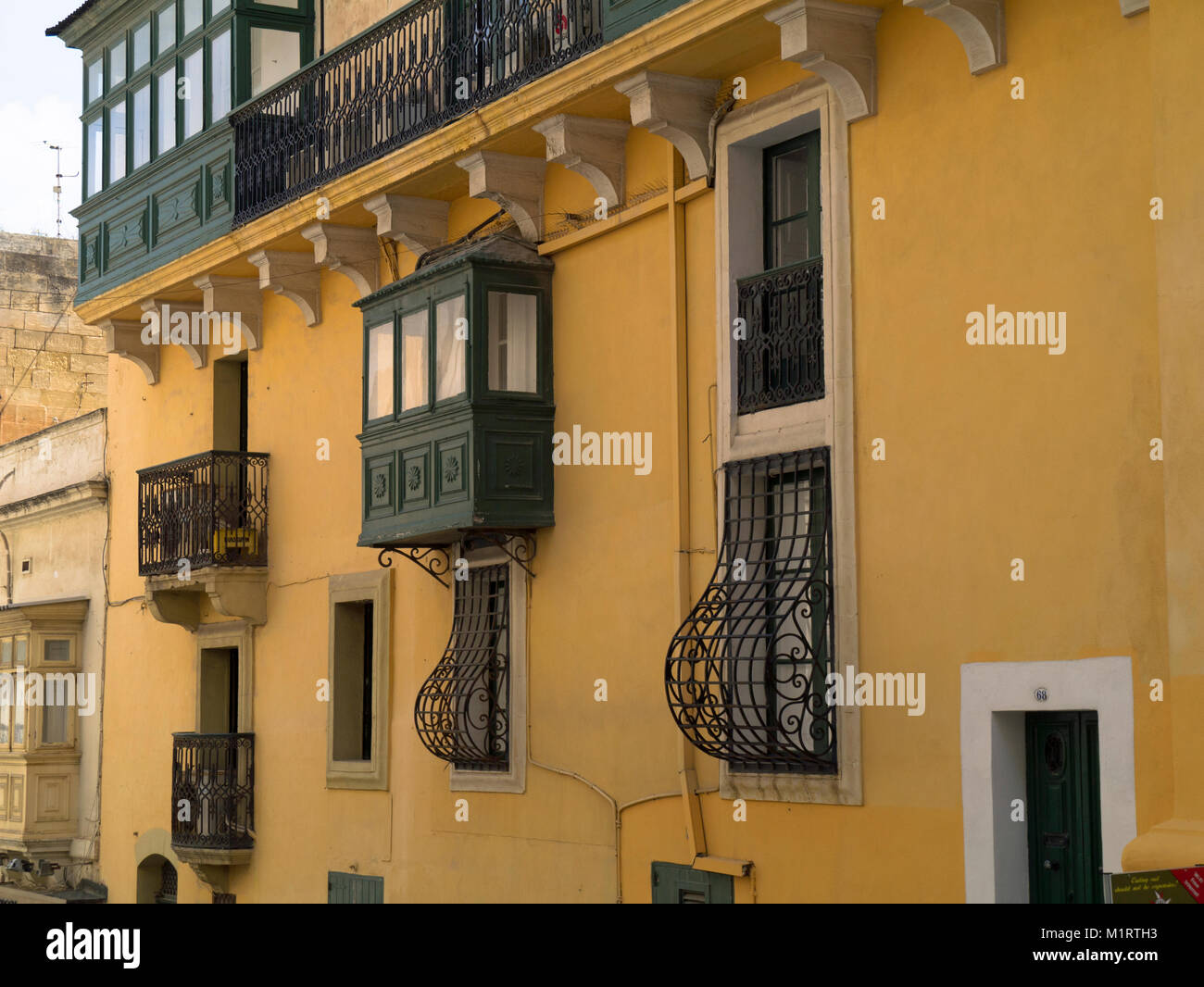 Traditional maltese wooden balconies and windows hi-res stock ...