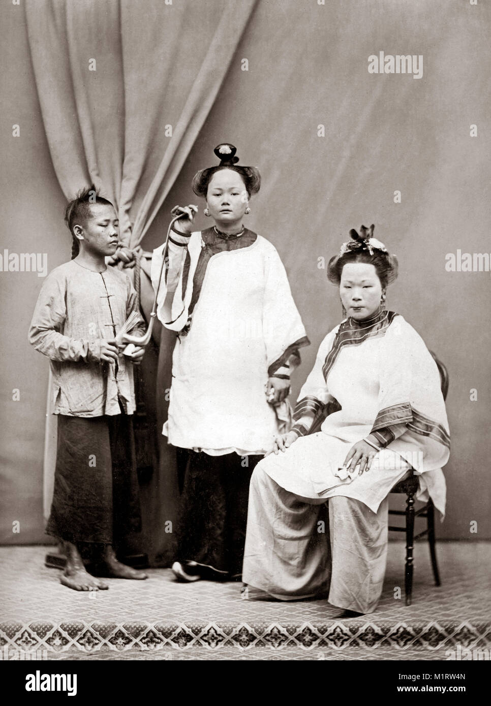 c. 1880s China - two women with bound feet Stock Photo - Alamy