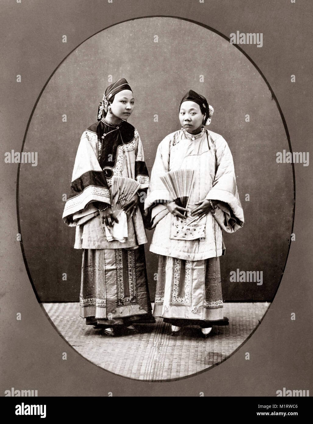 Two Chinese women with bound feet, China c.1880s Stock Photo - Alamy