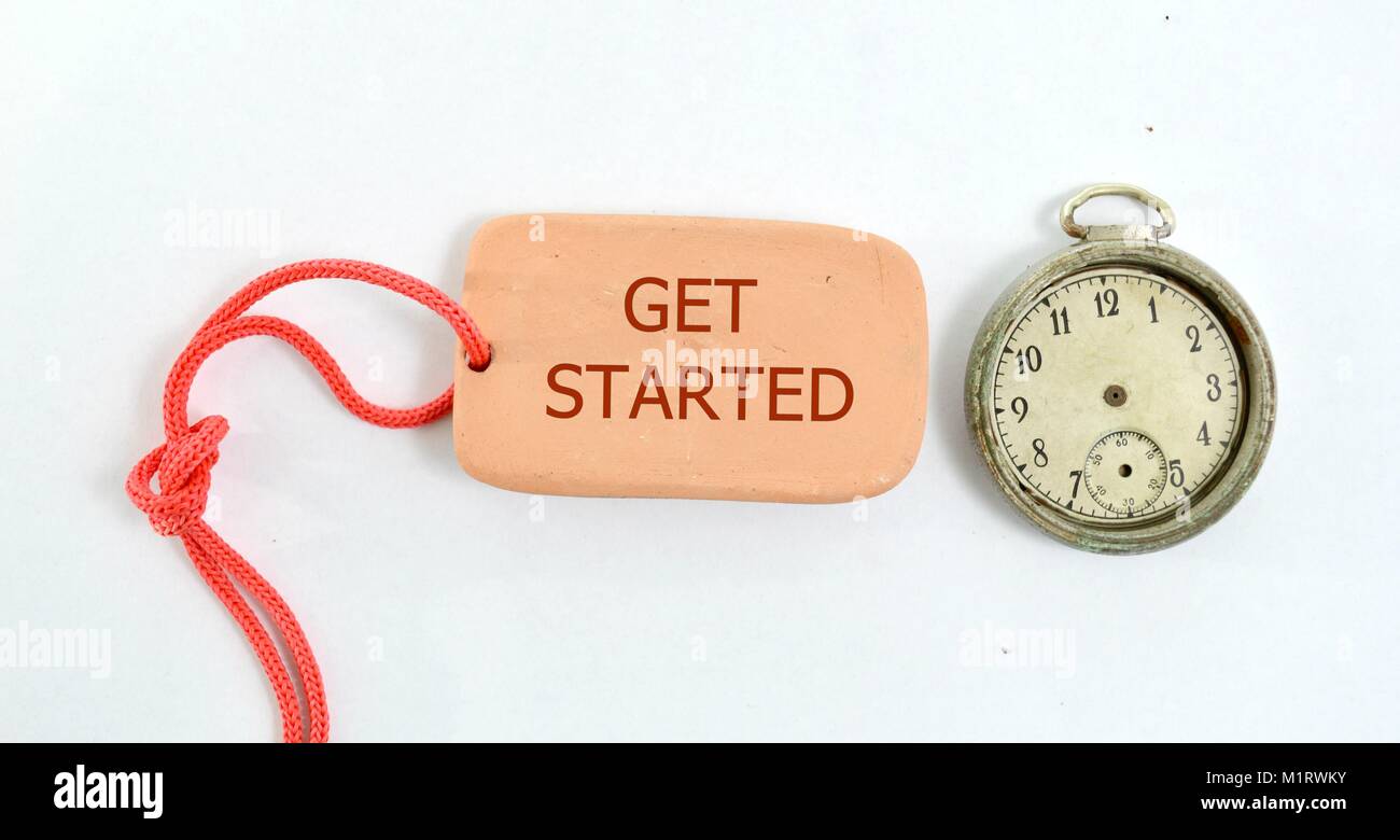 image of a clay plate and vintage clock with text get started Stock ...