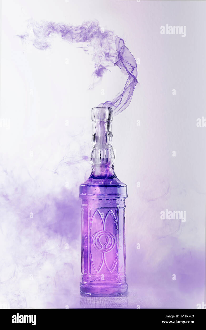 Purple magic wizards potion Stock Photo - Alamy