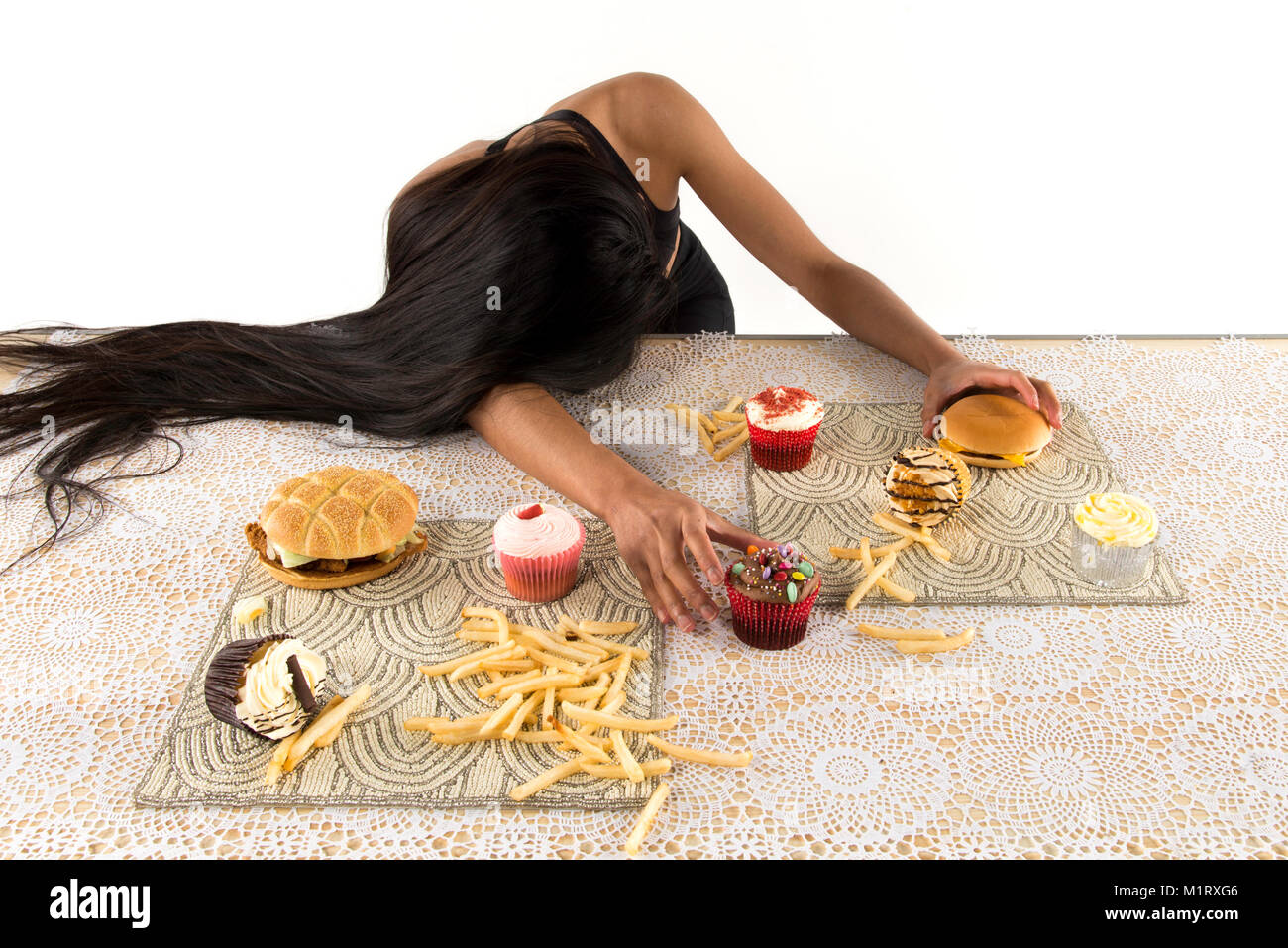 hand grabbing junk food Stock Photo - Alamy