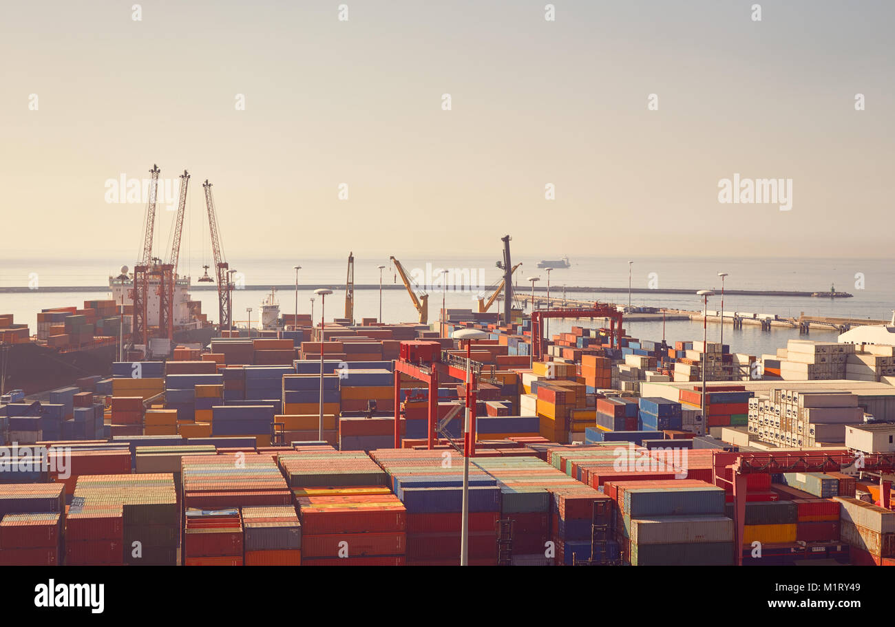 Sea port terminal with cranes, ships for unloading and a large number of containers Stock Photo ...