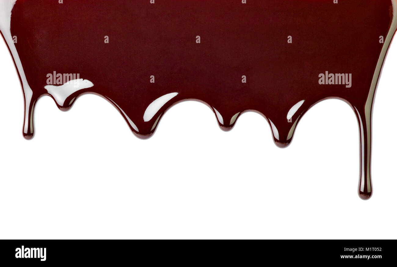 close up of chocolate syrup leaking on white background Stock Photo - Alamy