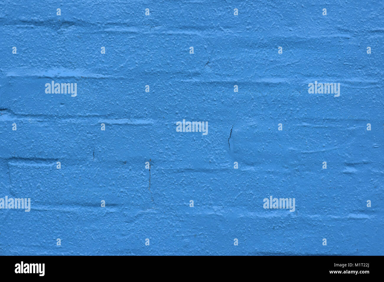 Brick painted blue close up abstract texture background Stock Photo - Alamy