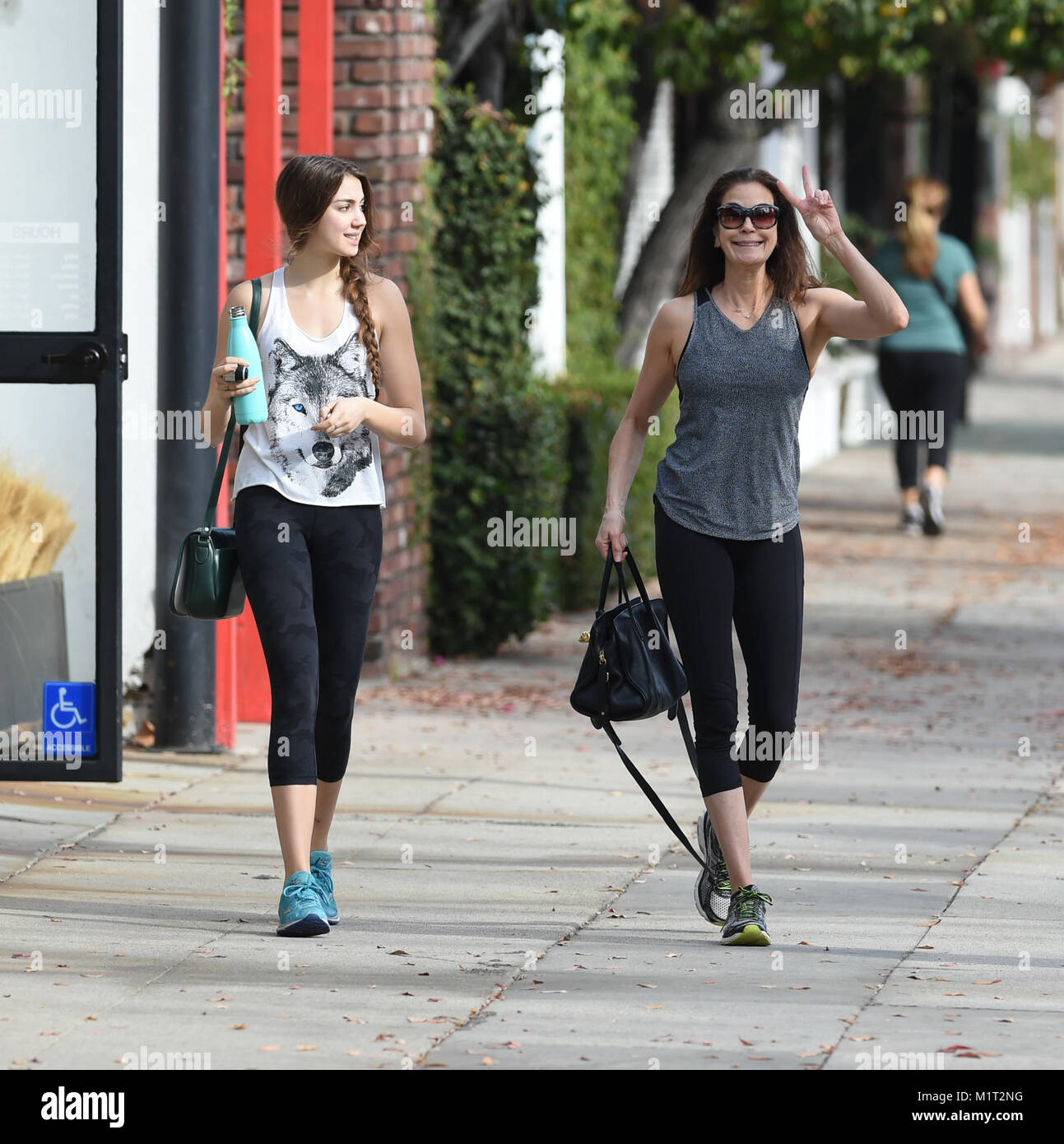 Teri Hatcher and her daughter Emerson Tenney leave a gym after working ...
