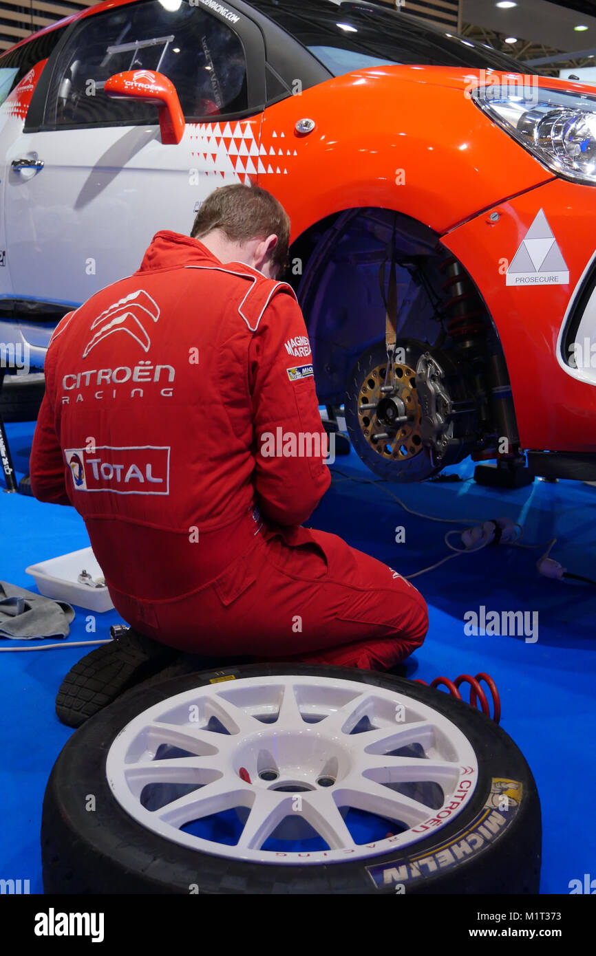 Young mechanic apprentice makes a demonstration at the "Mondial des ...