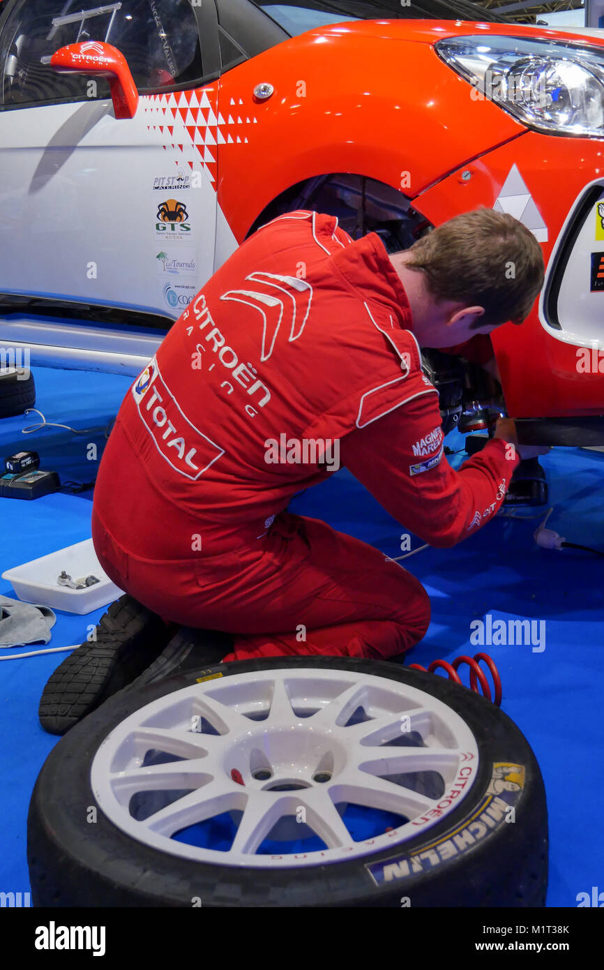 Young mechanic apprentice makes a demonstration at the "Mondial des ...