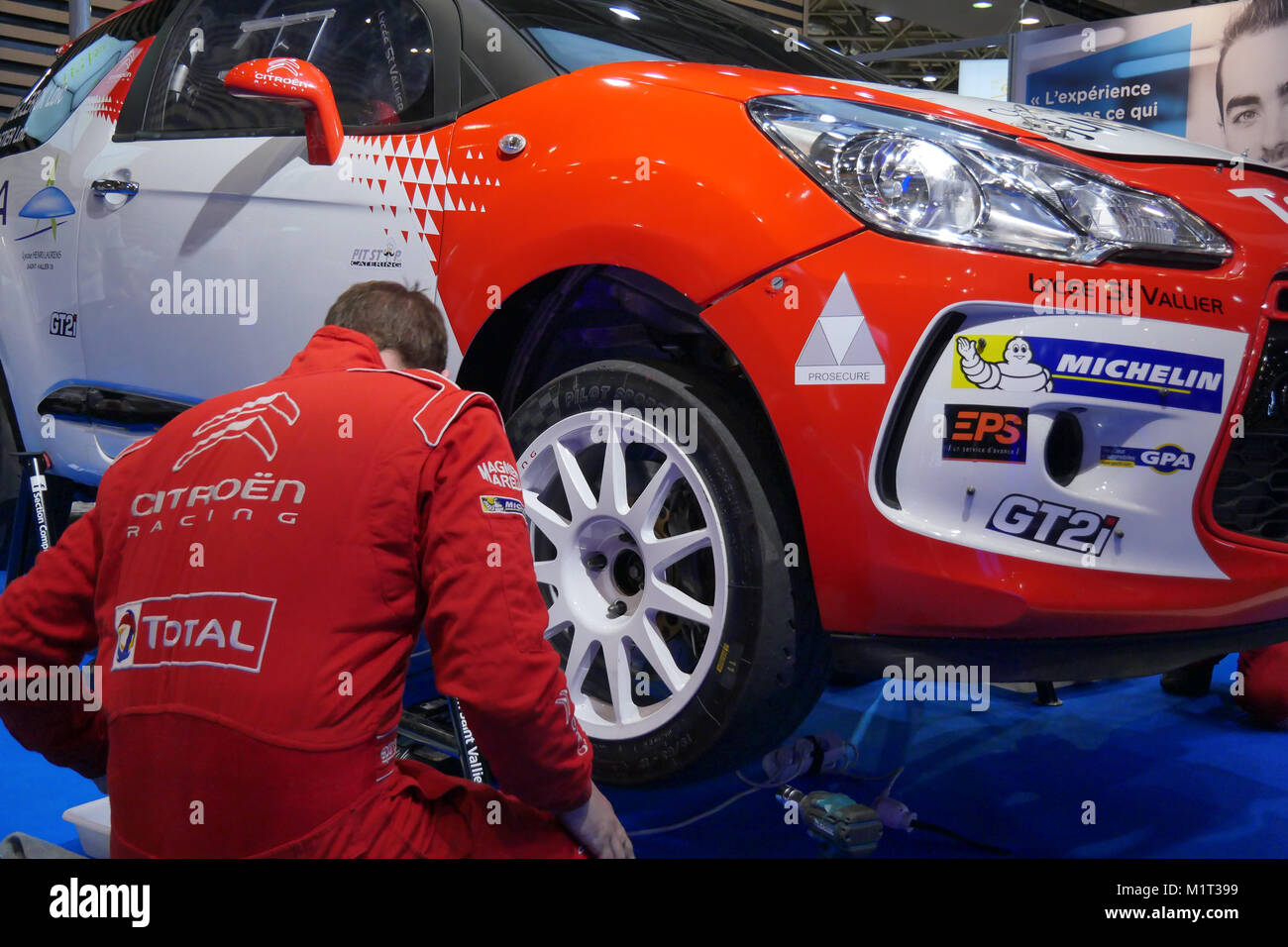 Young mechanic apprentice makes a demonstration at the "Mondial des ...