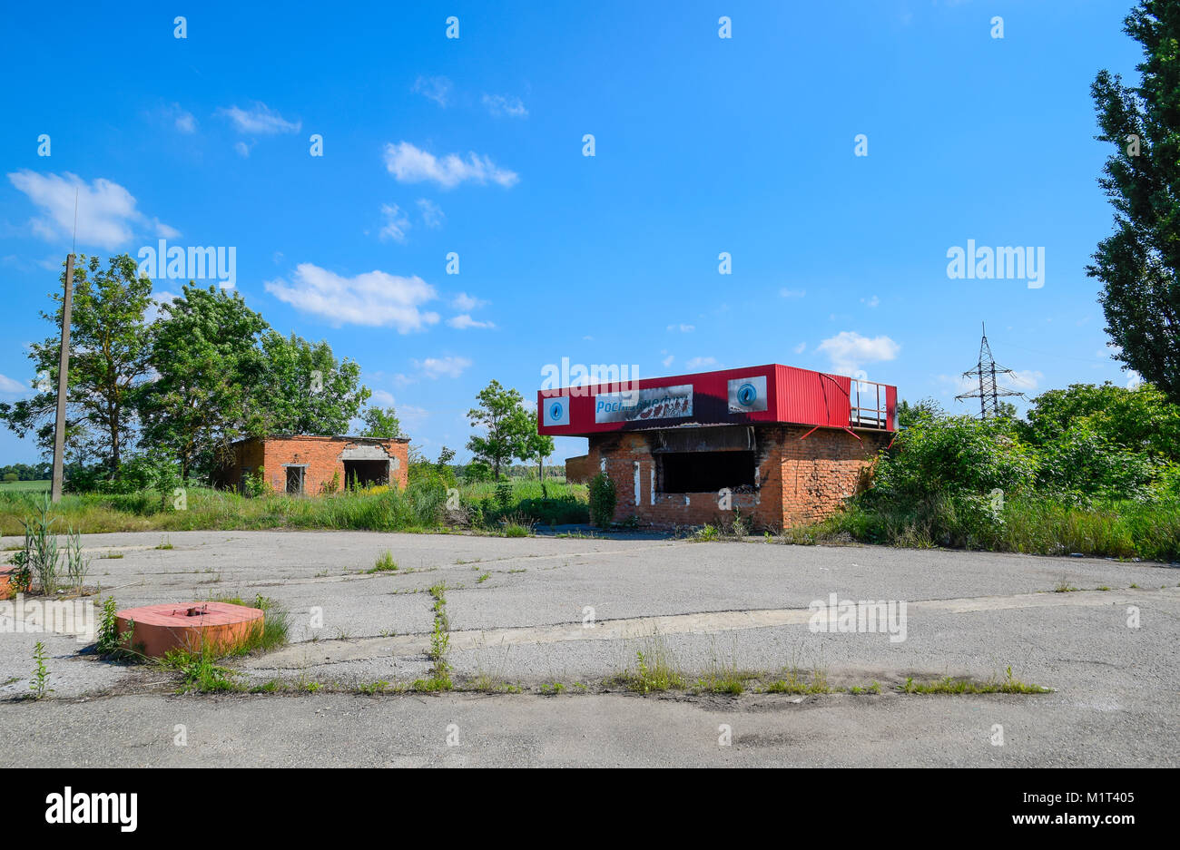 Burned gas station. Ruins in the place of a burnt petrol station Stock ...