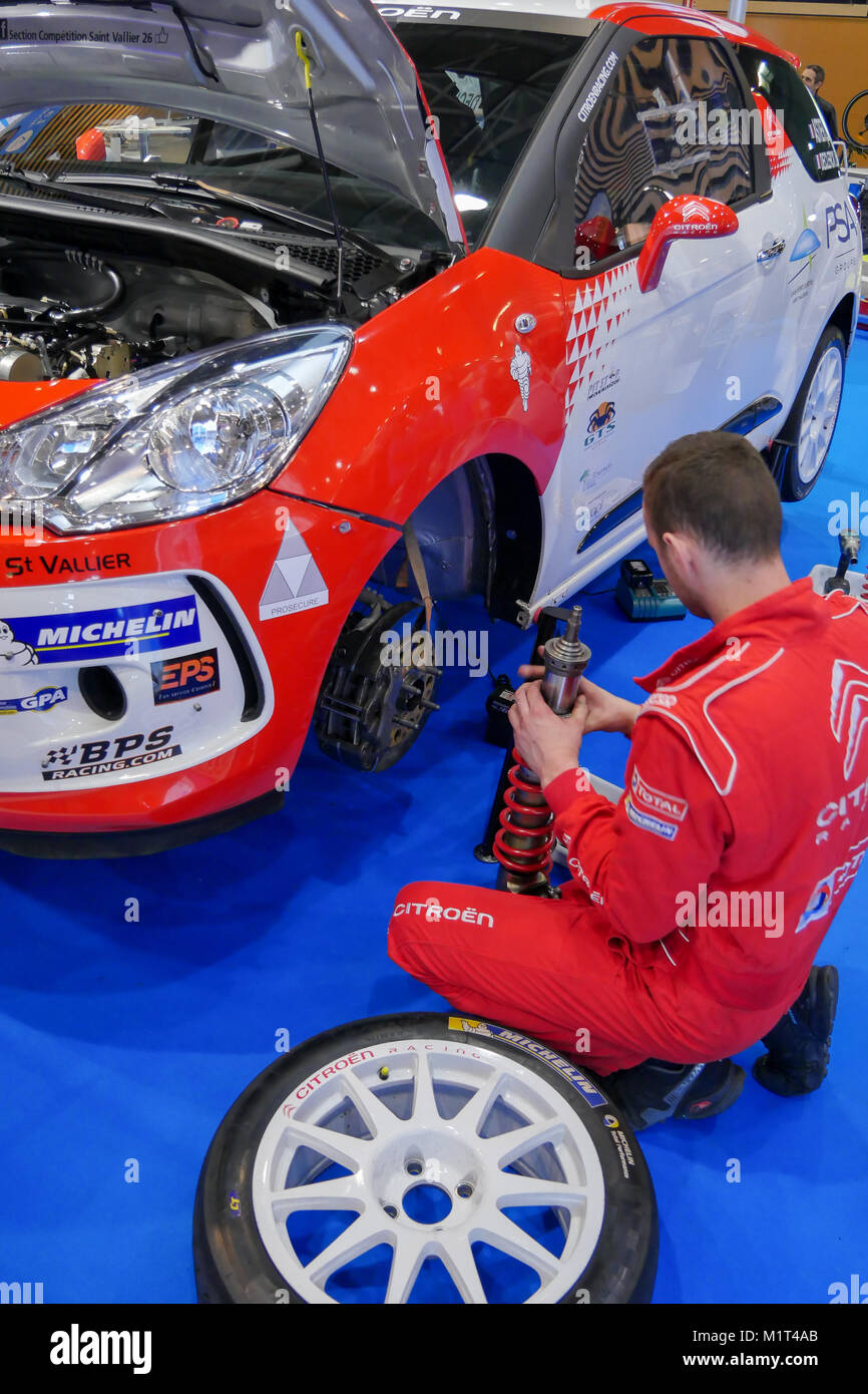 Young mechanic apprentice makes a demonstration at the "Mondial des ...