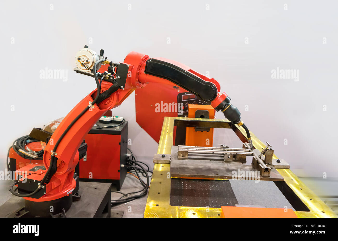 Automatic robotic arm for metal welding operations Stock Photo - Alamy