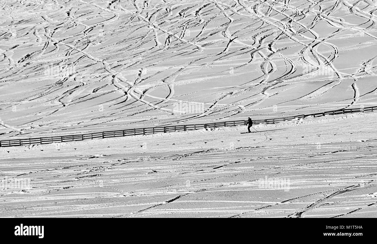 Beautiful evening winter view at 2000m altitude with traces slope in ...