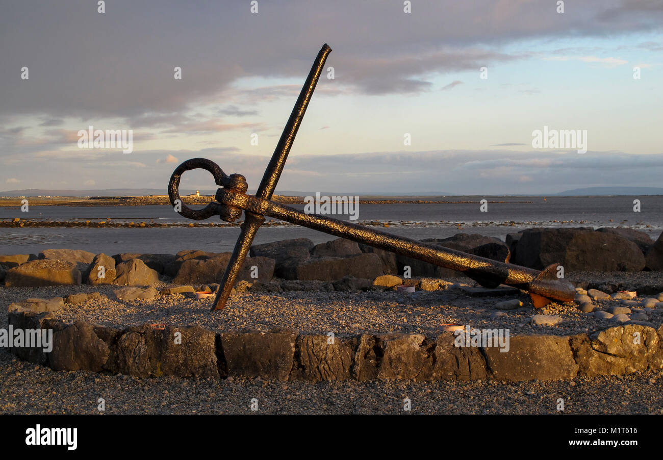 Salthill Promenade anchor ring frames the lighthouse Stock Photo - Alamy