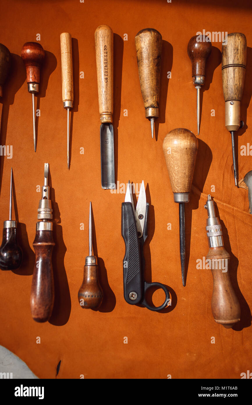 The tools of a tanner for working with leather Stock Photo - Alamy