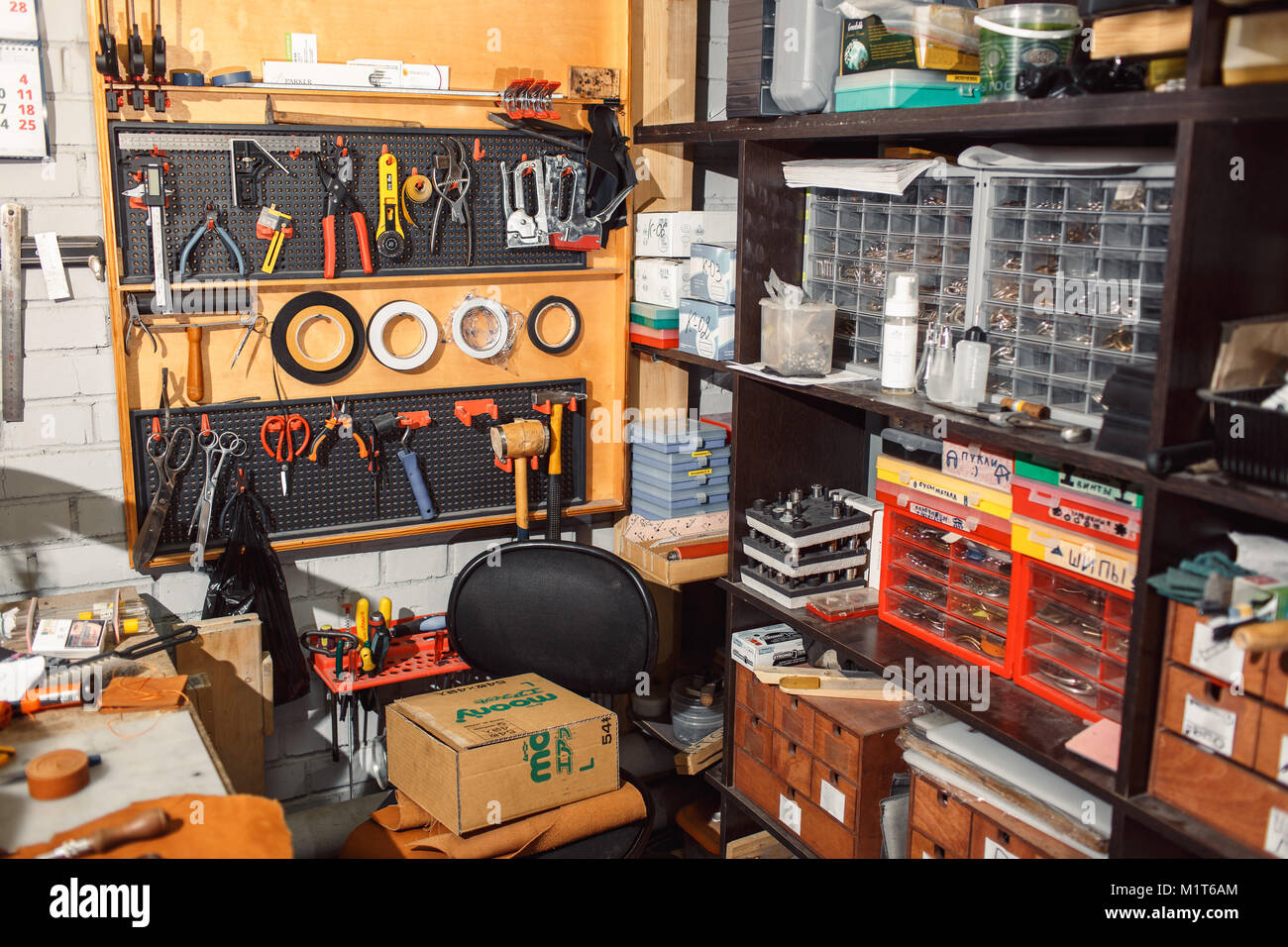 The tools of a tanner for working with leather Stock Photo - Alamy