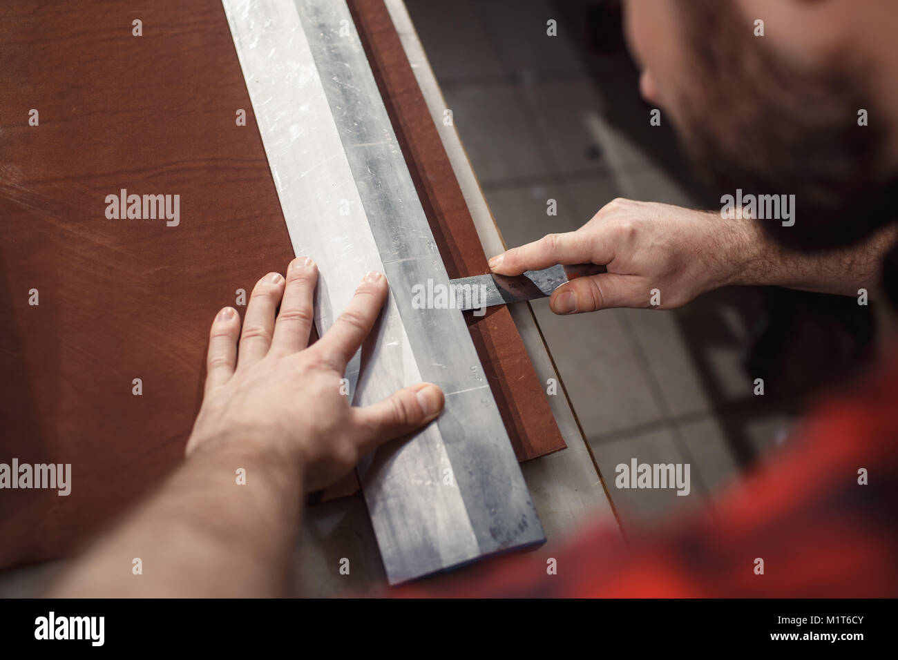 Working process in the leather workshop. Tanner in old tannery Stock ...