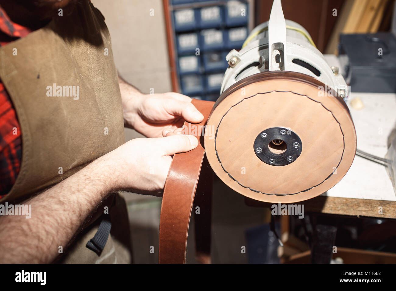 Close up of hands tanner performs work on table with tools Stock Photo ...