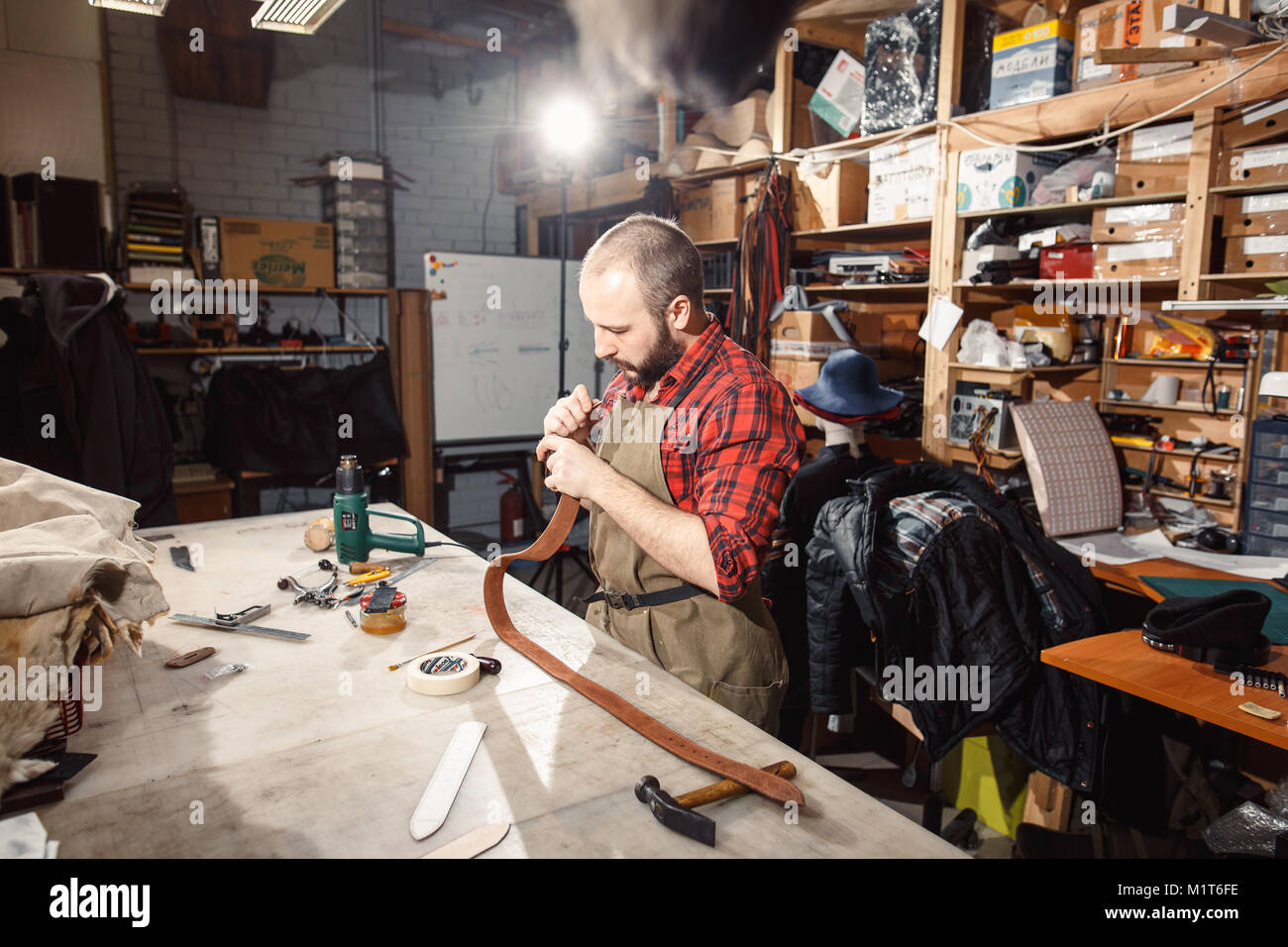 Working process in the leather workshop. Tanner in old tannery Stock ...