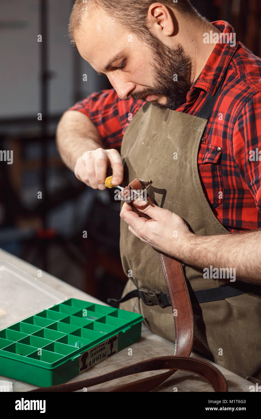 Working process in the leather workshop. Tanner in old tannery Stock ...