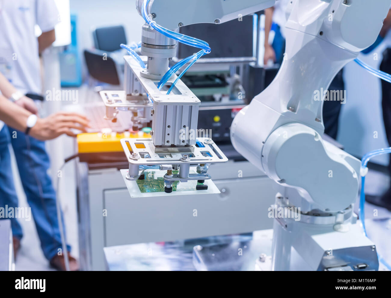 Pneumatic input to robot handle grip handle Stock Photo - Alamy