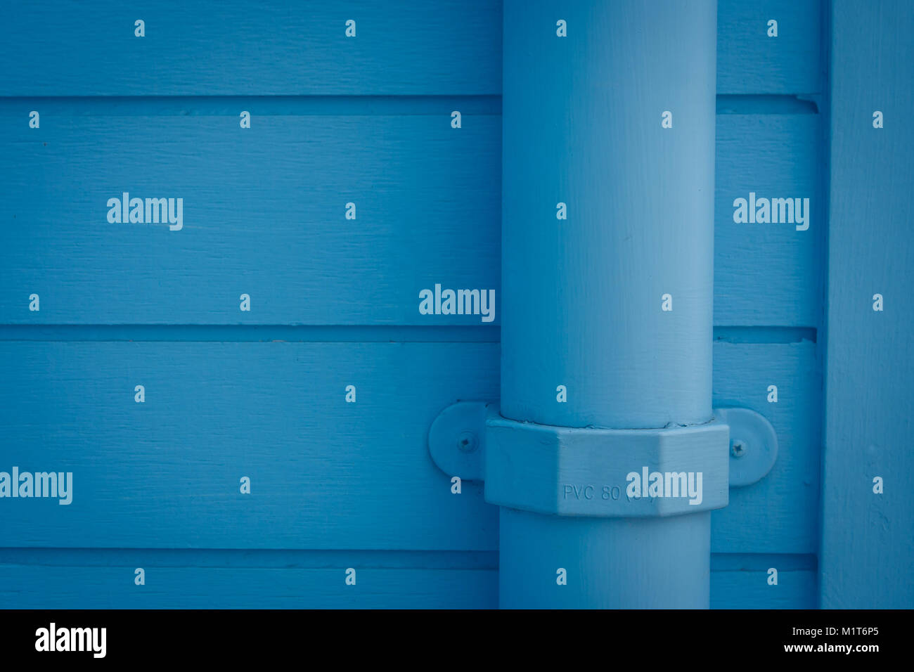 Close up blue water pipe with pvc pipe lock setting on vintage blue ...