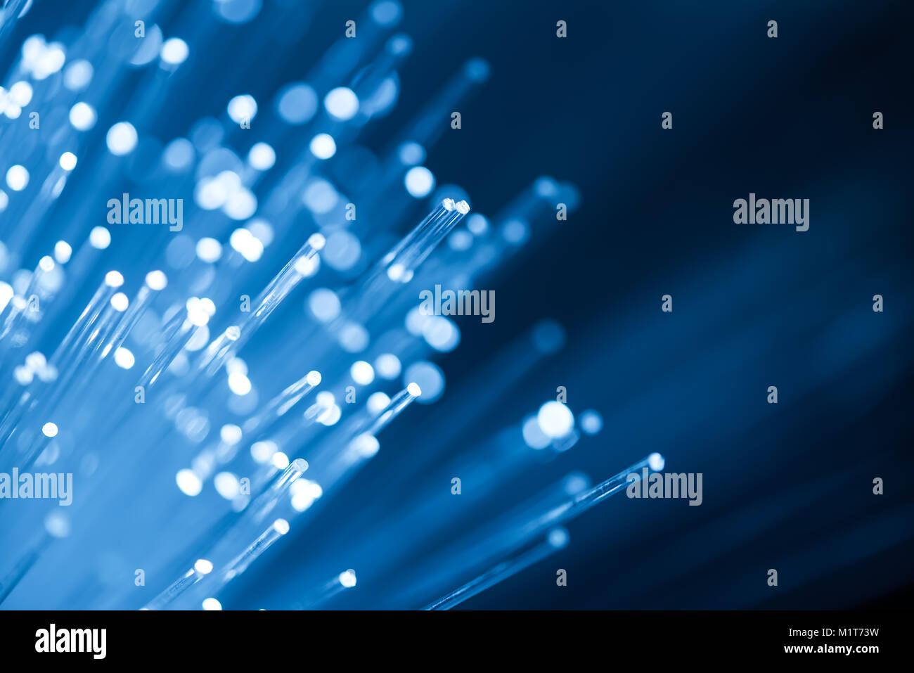 optical fibres dinamic flying from deep on technology background Stock ...