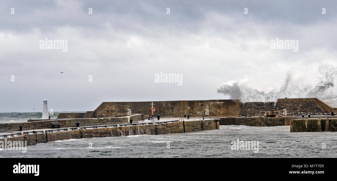 CULLEN BANFFSHIRE SCOTLAND SEA WALL BREACH UNDER REPAIR BATTERED BY ...