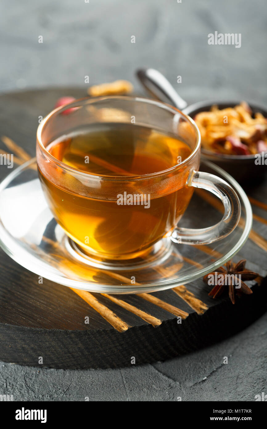 Cup of hot apple tea with spices Stock Photo - Alamy