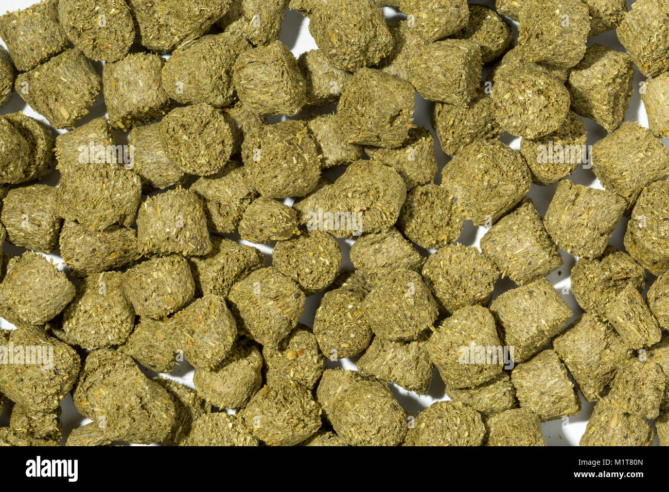 Rabbit feed pellets Stock Photo - Alamy
