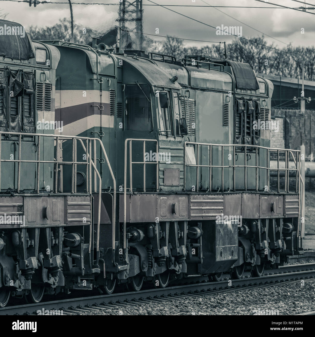 Old diesel cargo locomotive. Freight train in action Stock Photo - Alamy